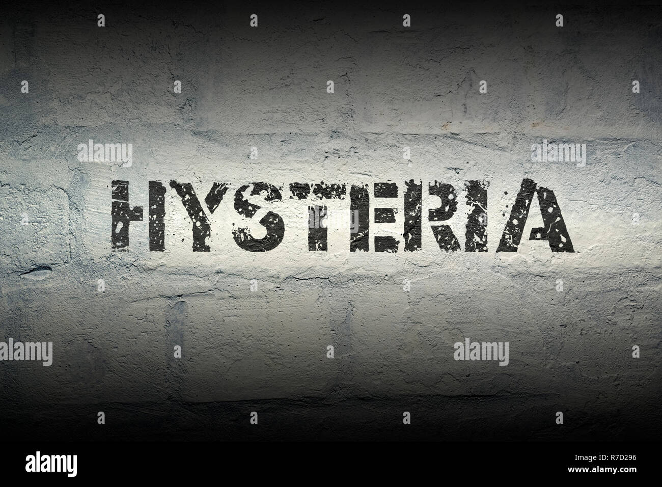 hysteria stencil print on the grunge white brick wall Stock Photo - Alamy