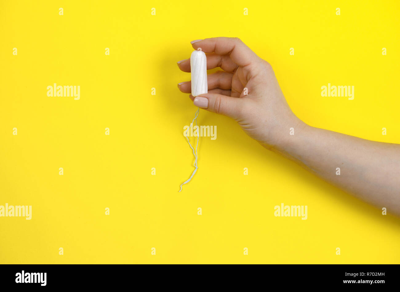 Cotton tampon. Womens comfort, hygiene and protection Stock Photo - Alamy