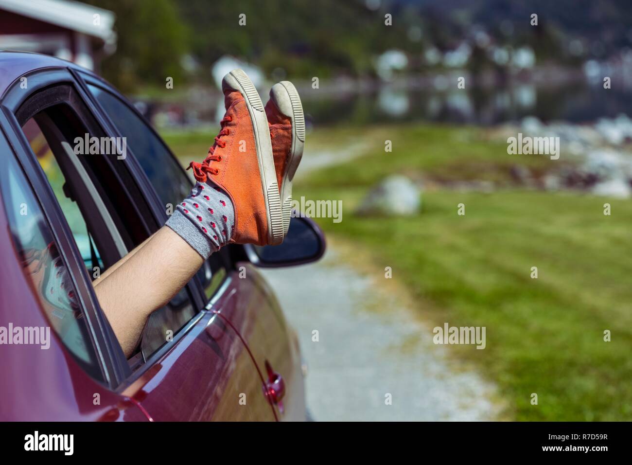 Young feet sticking out car hi-res stock photography and images - Alamy