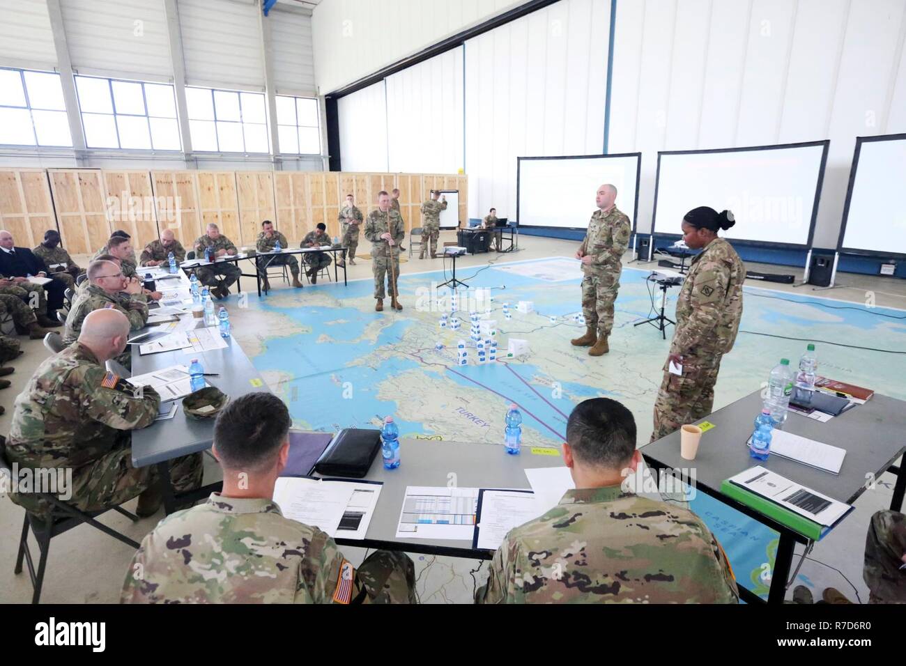 U.S. Army Capt. John Maham (center right), commander of Alpha Company ...