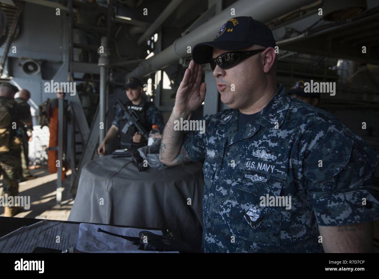 U.S. Navy IT1 Matthew Favila, an information systems technician ...