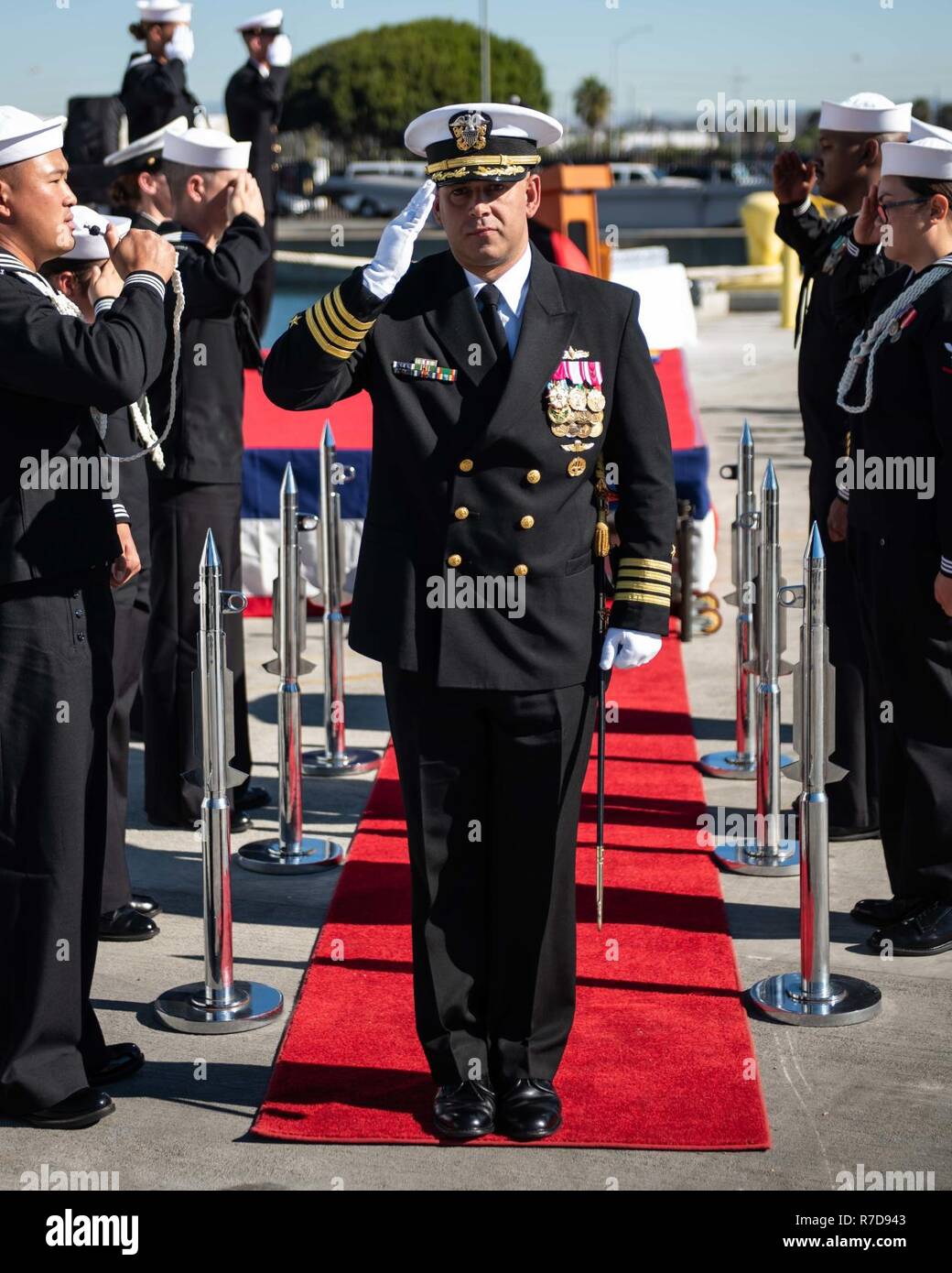 SAN DIEGO (Nov. 27, 2018) Capt. Andrew Carlson is piped aboard assuming ...