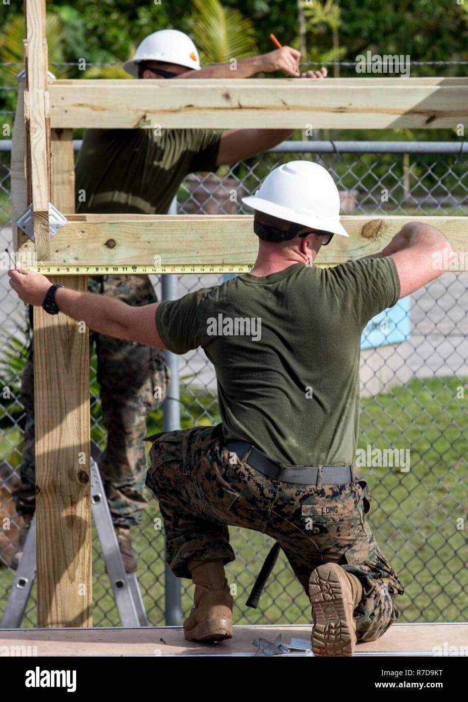 AIRAI, Republic of Palau - U.S. Marine Corps Cpl. Nathan Long, bottom ...