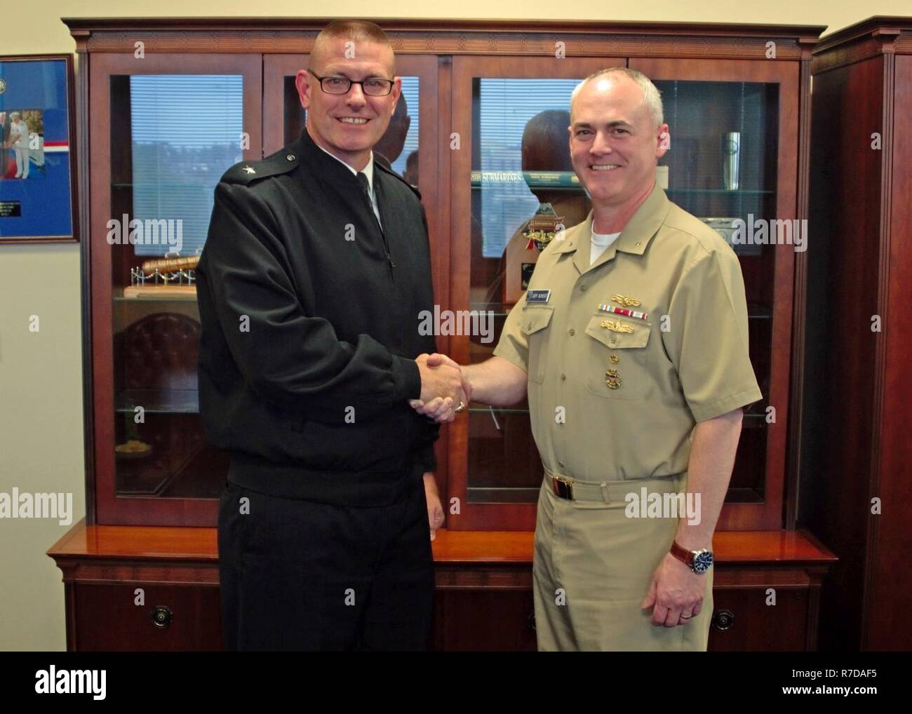 NAVAL BASE POINT LOMA (Nov. 27, 2018) Rear Adm. Dave Welch, left ...