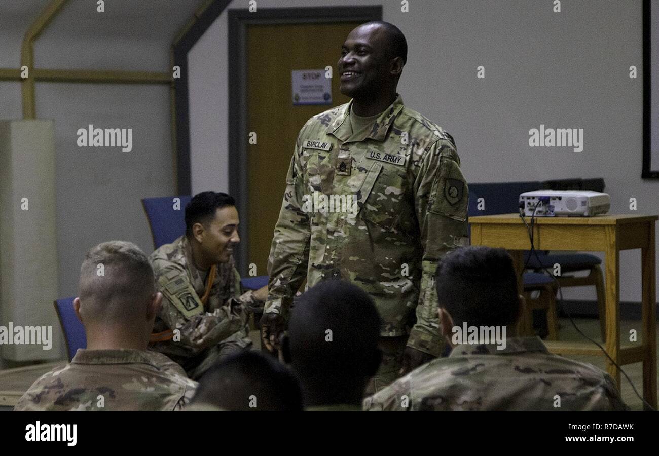 Sgt. 1st Class Barclay of the 300th Sustainment Brigade instructs the ...