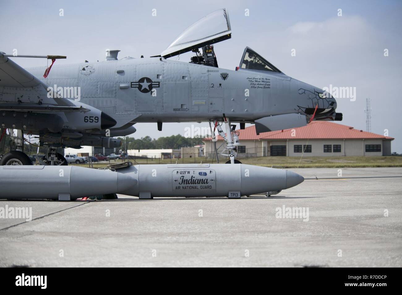 Travel pods sit next to an A-10C "Warthog" aircraft during Operation ...