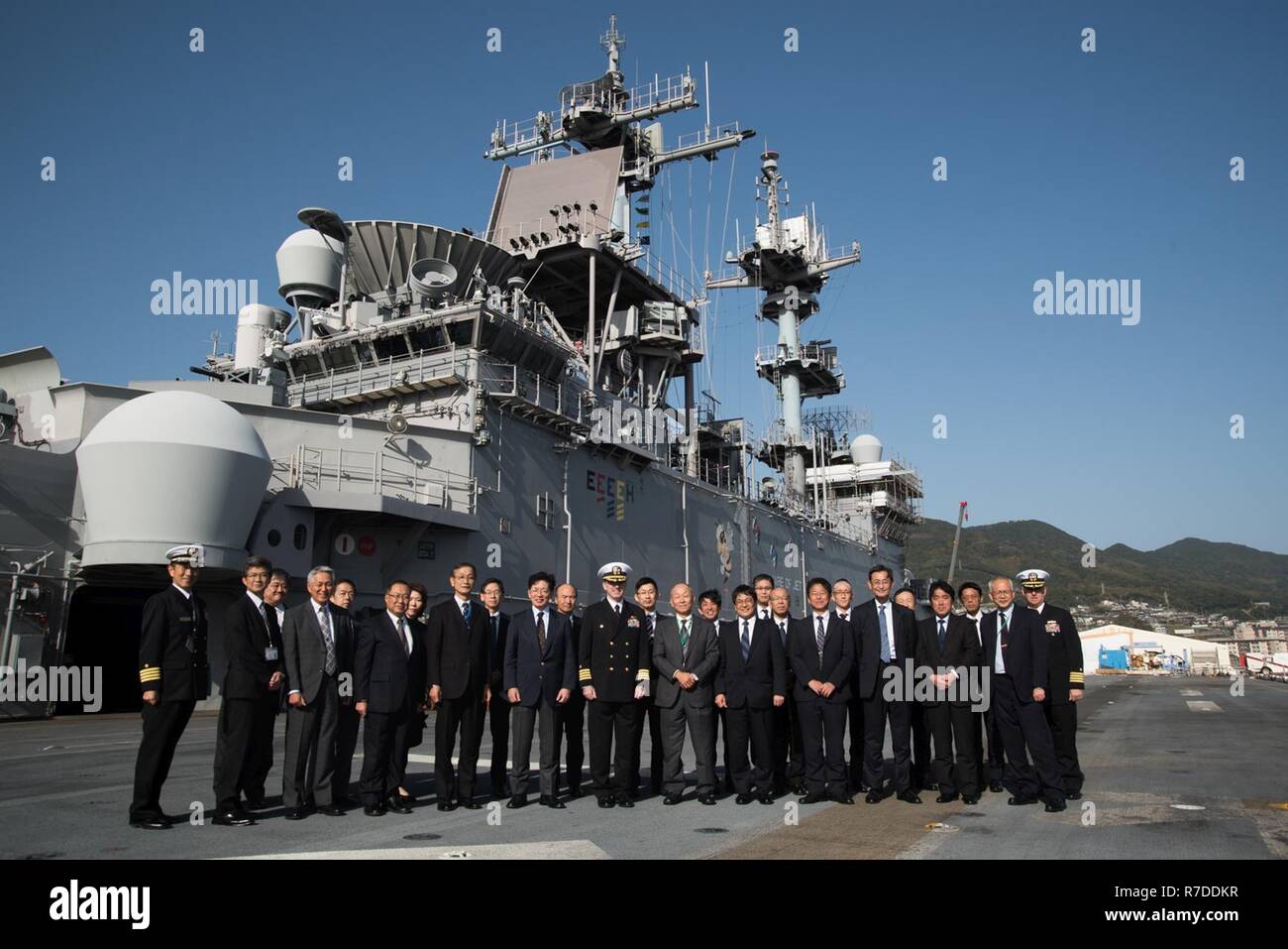 SASEBO, Japan (Dec. 5, 2018) Capt. Colby Howard (center), commanding ...