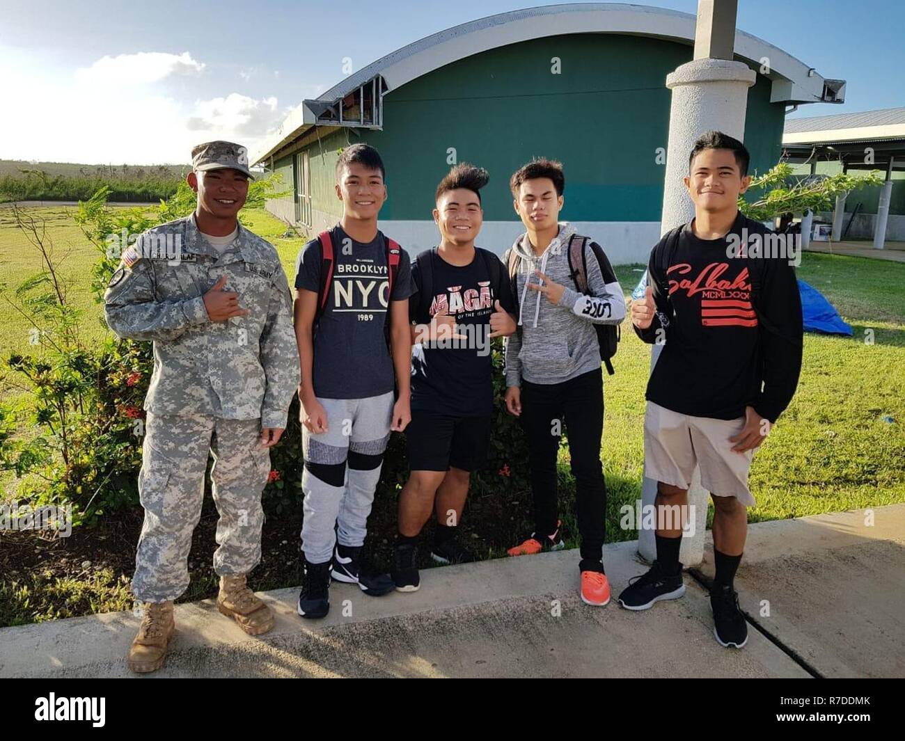 U.S. Army Sgt. John Chargaulaf, left, a Soldier with the Guam Army ...