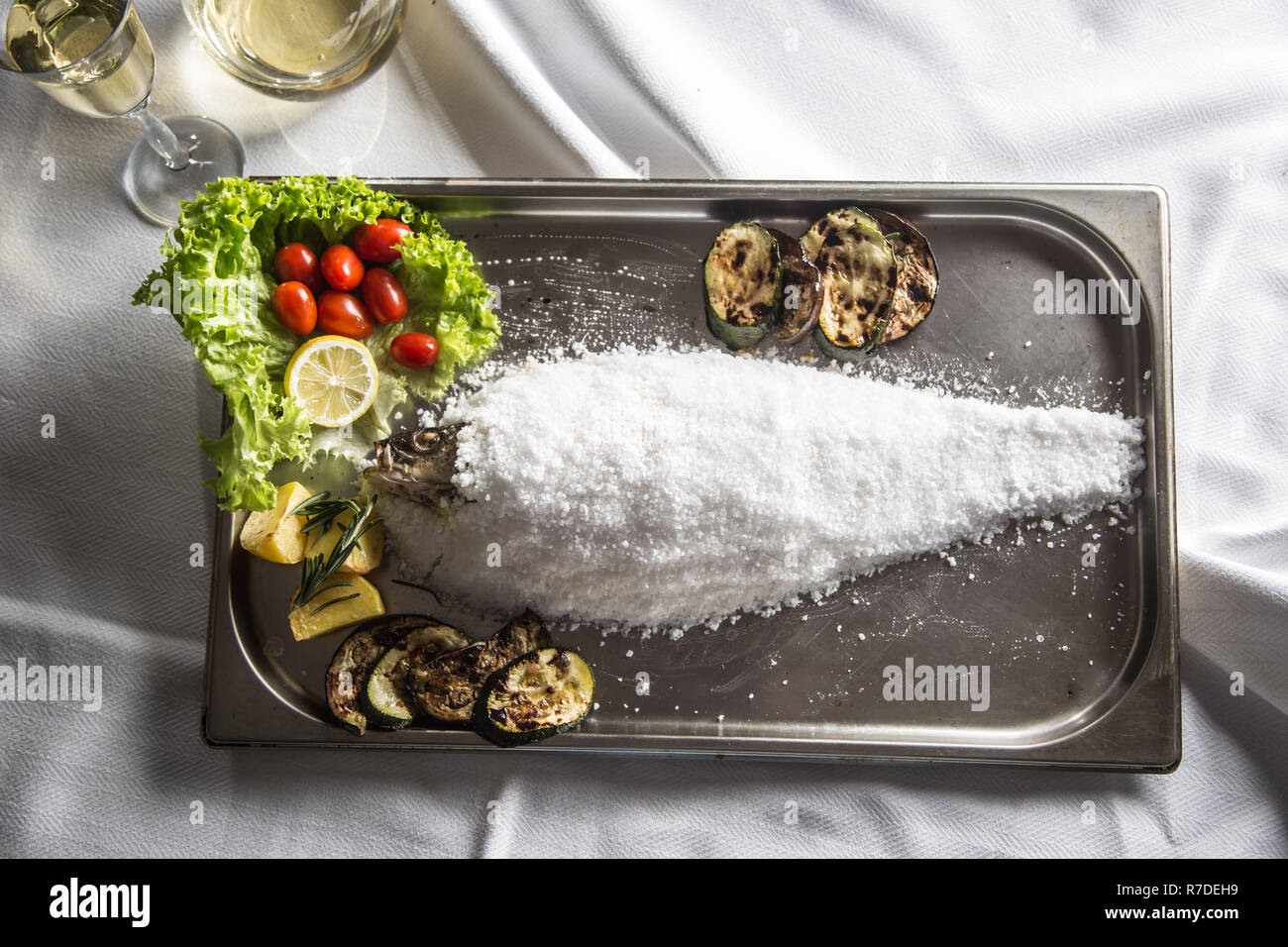 Top of view traditional italian or mediterraneean fish roasted in sea ...