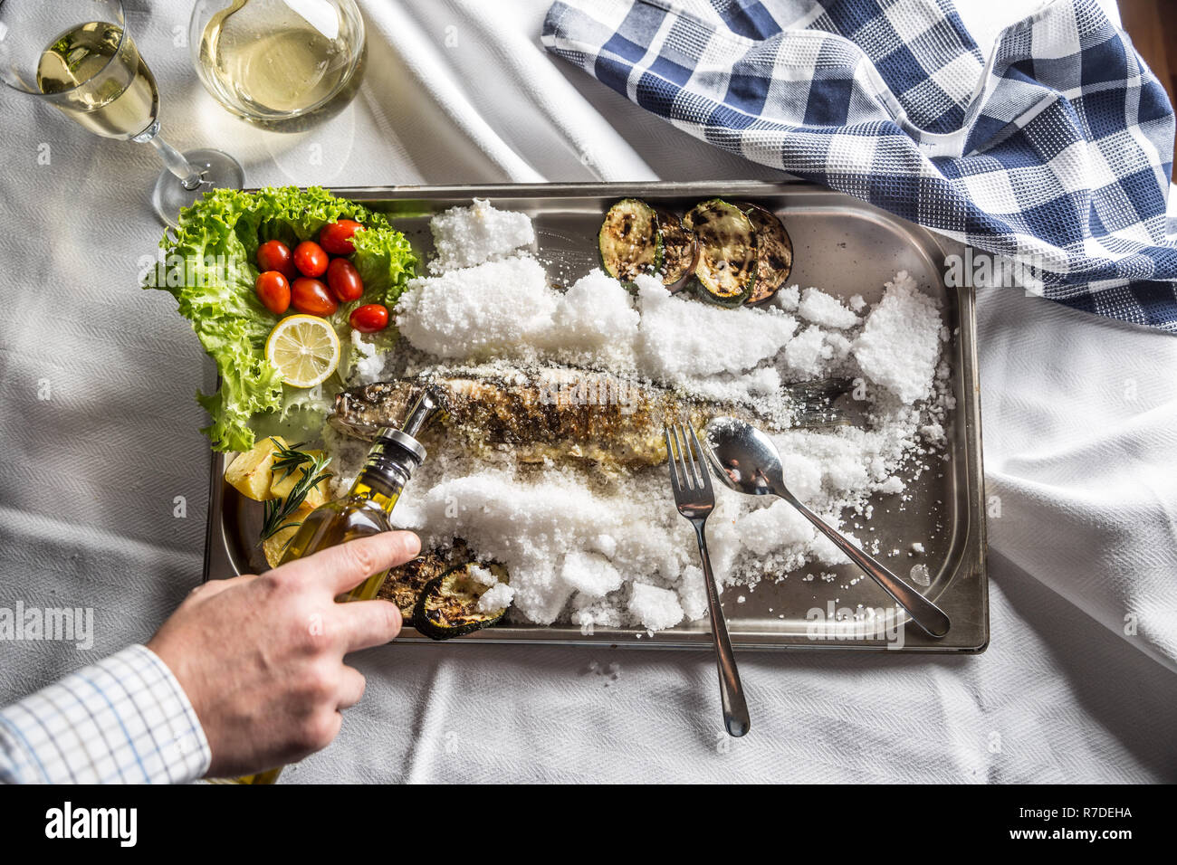 Top of view traditional italian or mediterraneean fish roasted in sea ...