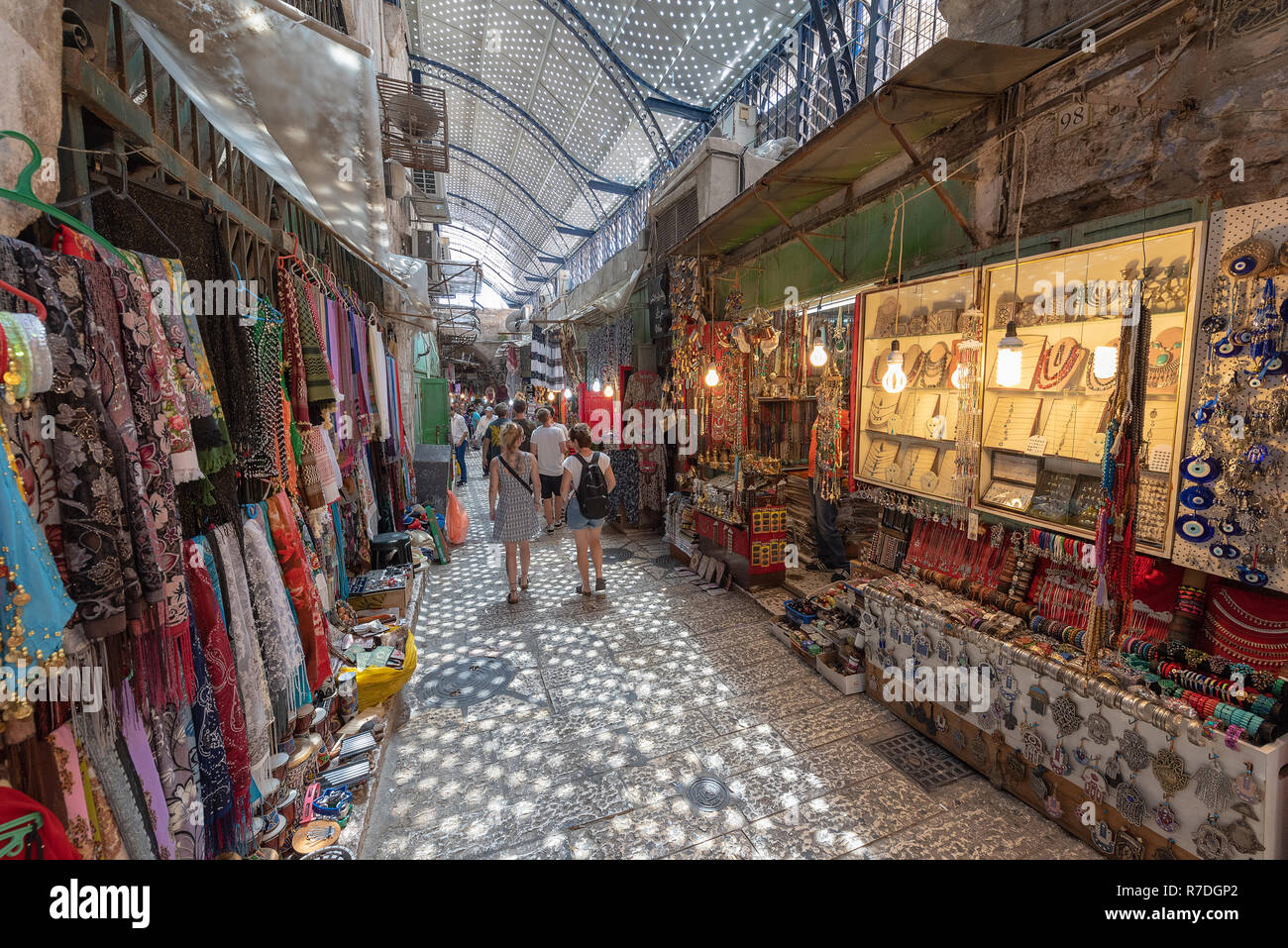 People walking in the muslim quarter of the old city of Jerusalem ...