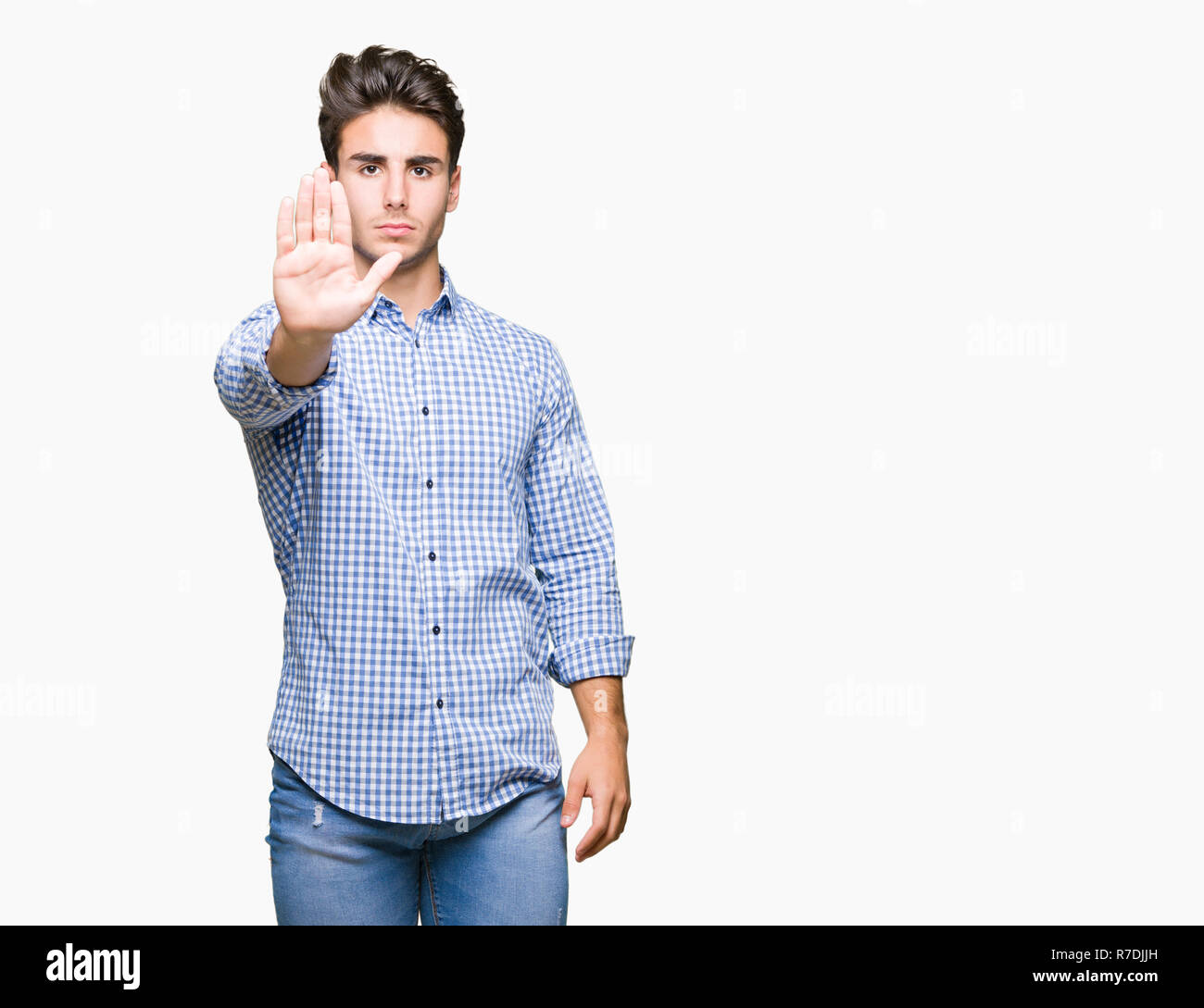 Young handsome business man over isolated background doing stop sing ...