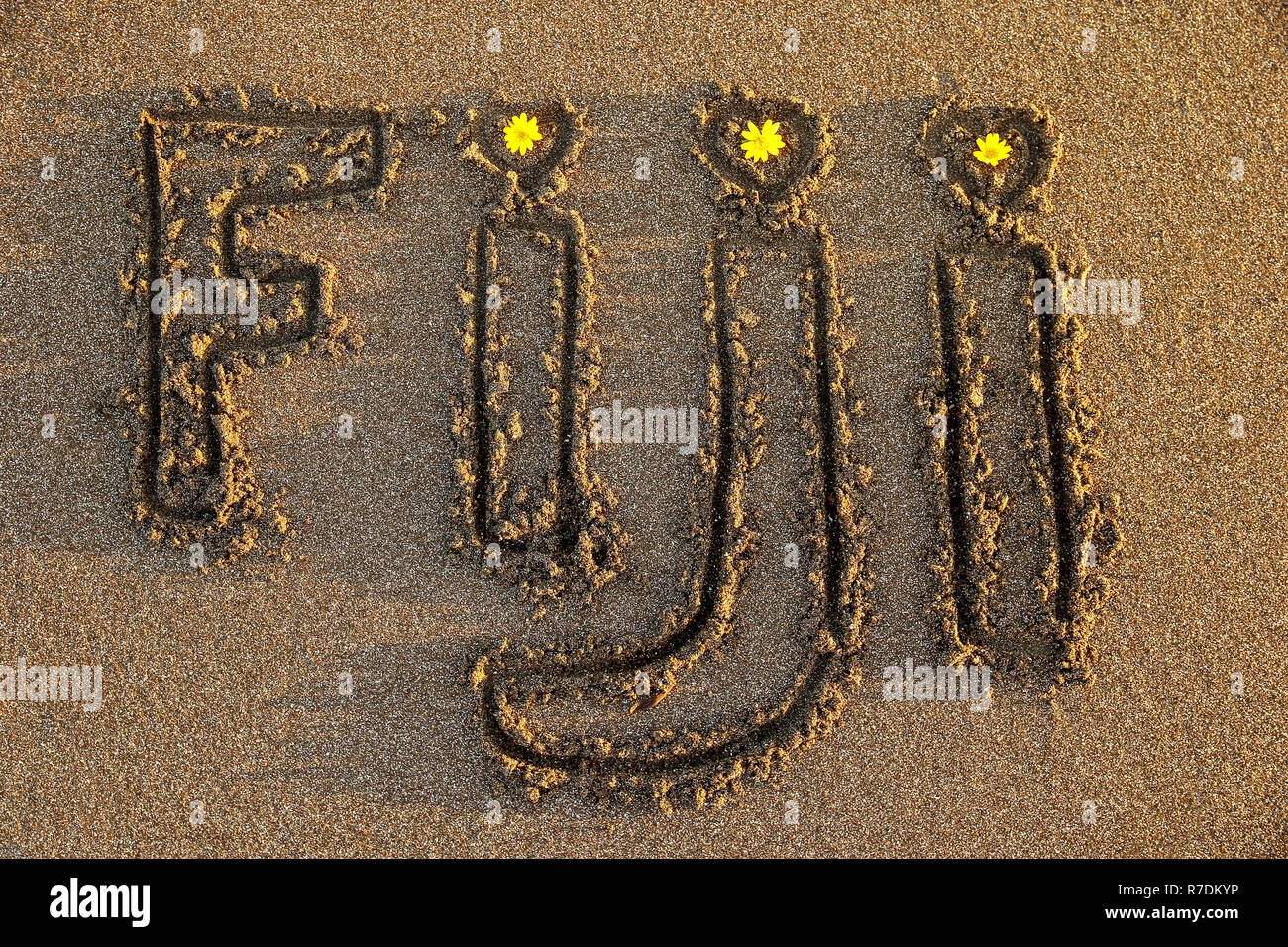 Word Fiji written on a beach - travel concept Stock Photo - Alamy