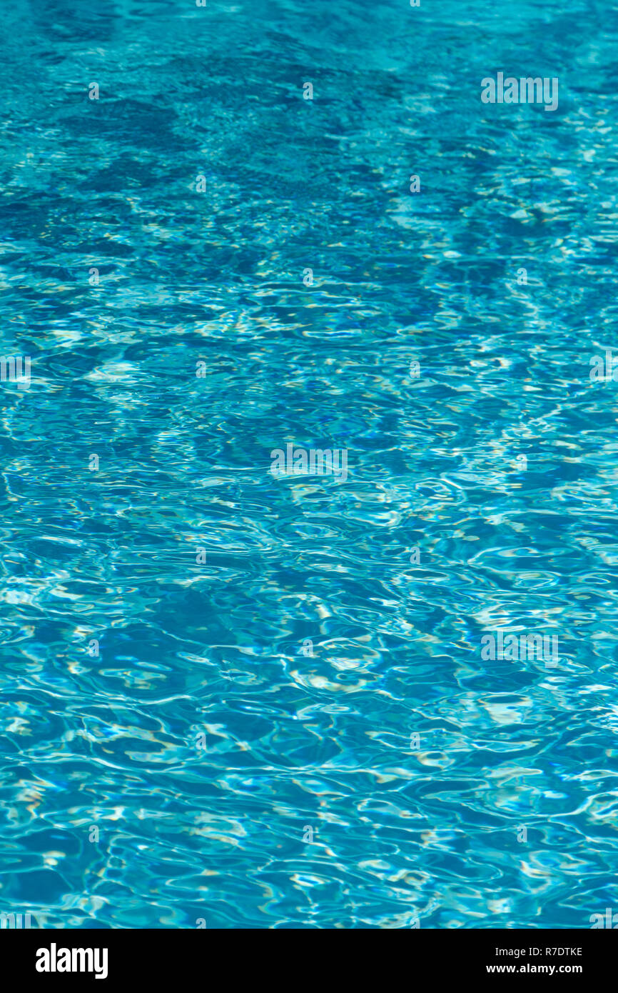 Blue water in swimming pool background. Ripple Water in swimming pool ...