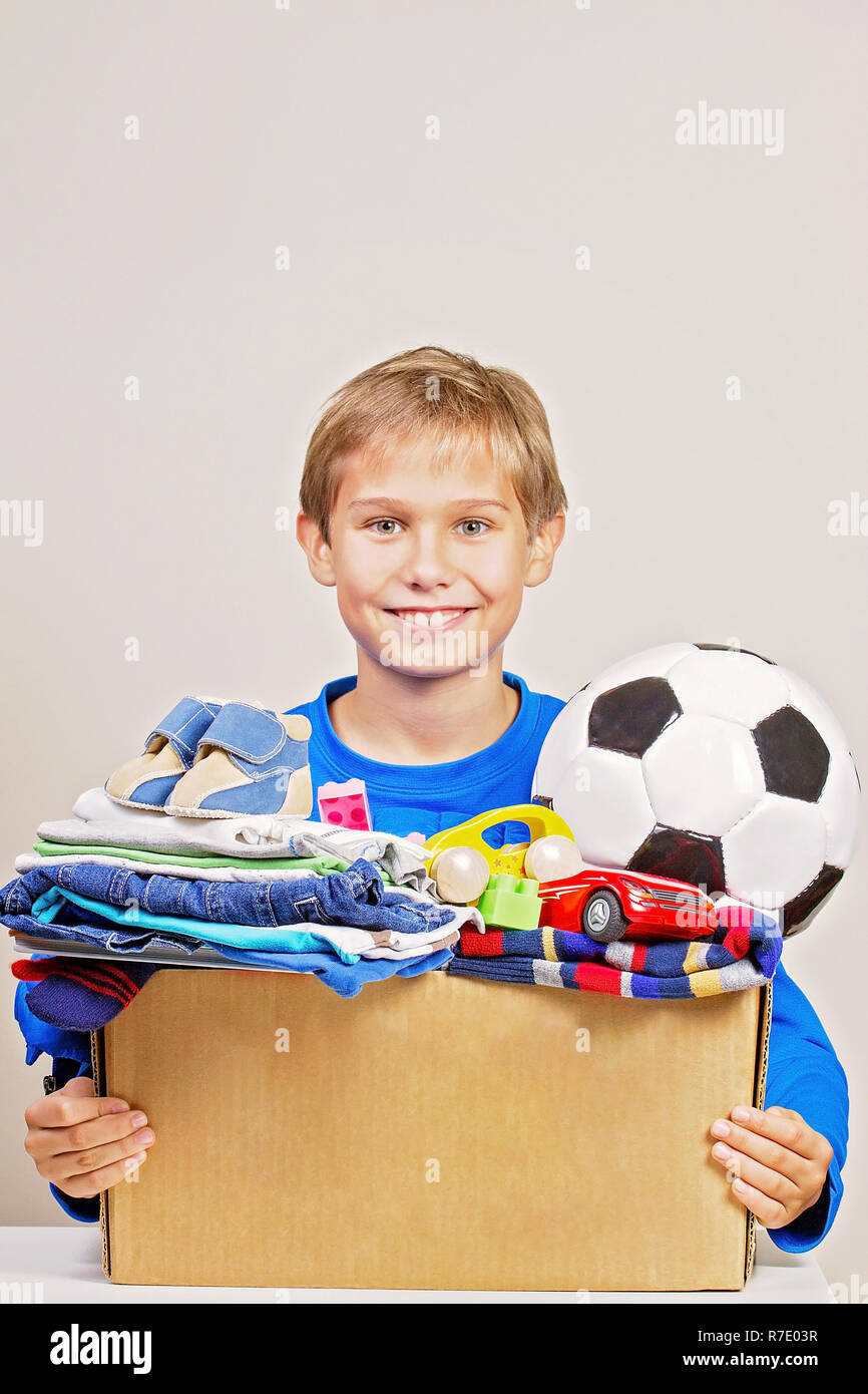 Child donation box toys hi-res stock photography and images - Alamy