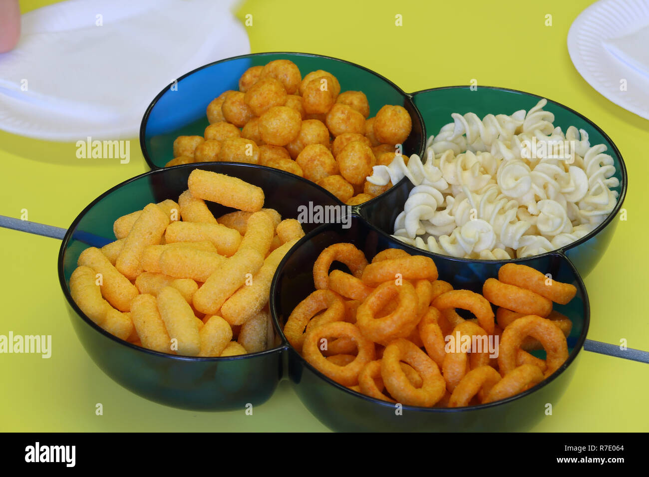 Four bowls with a variety of party snacks in Stock Photo - Alamy