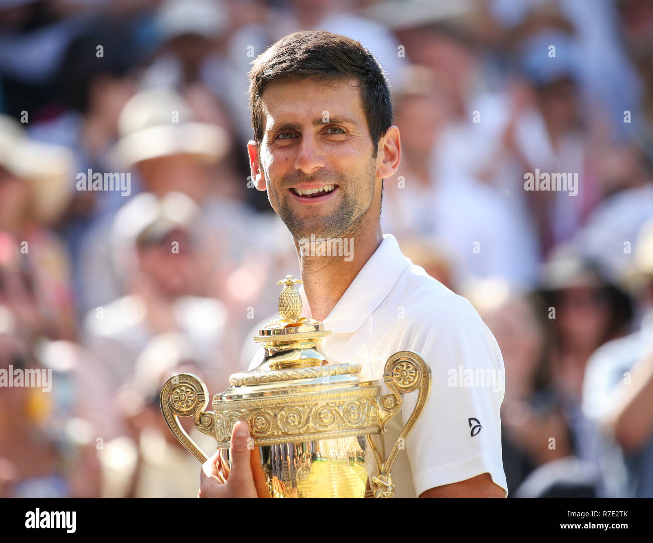 Standing holding trophy professional sportsperson smiling success hi ...