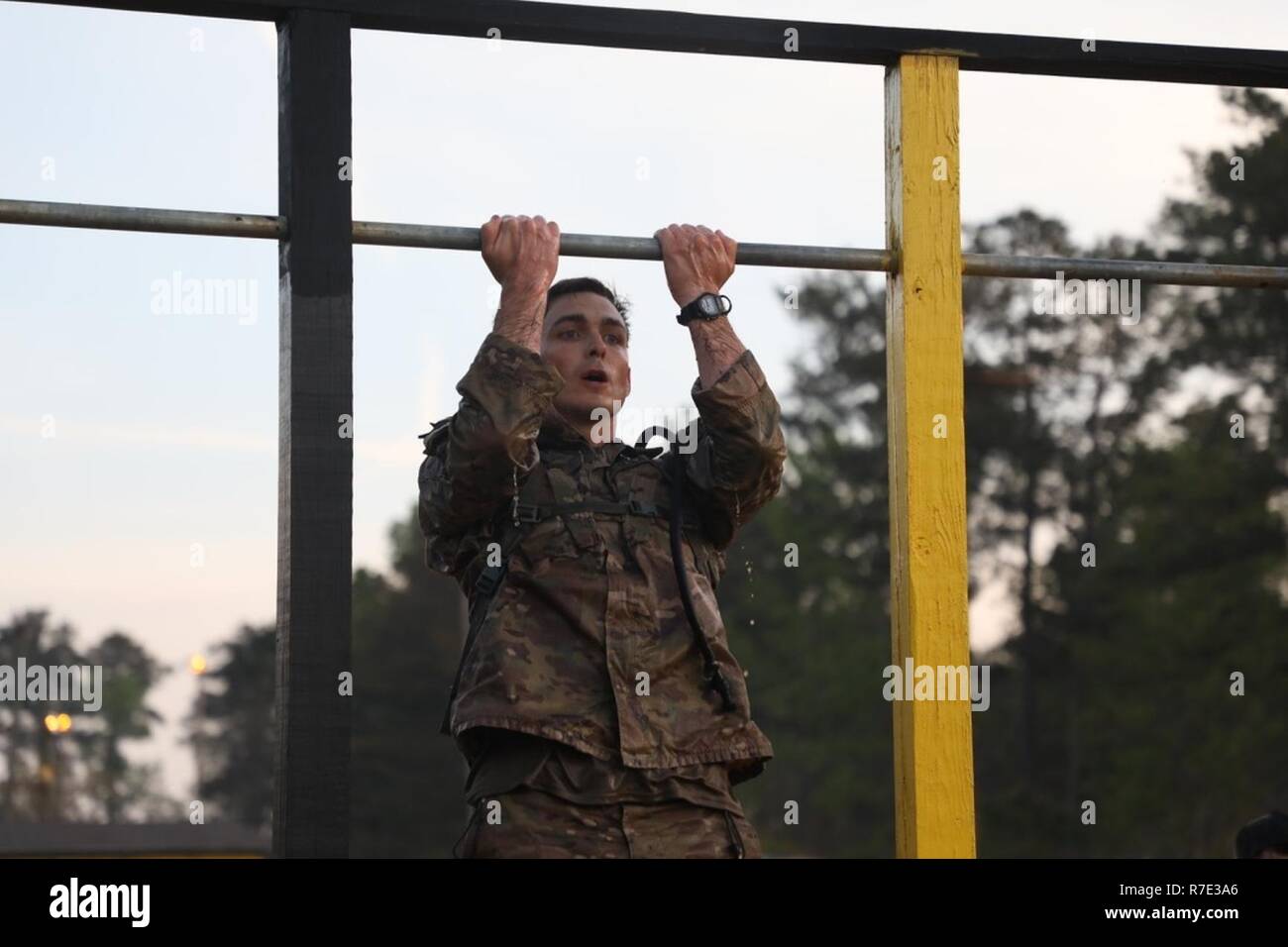 A U.S. Army Ranger performs pull-ups on Malvesti during The 35th Annual ...