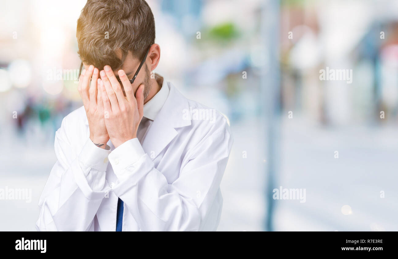 Young scientist covering face hands hi-res stock photography and images ...