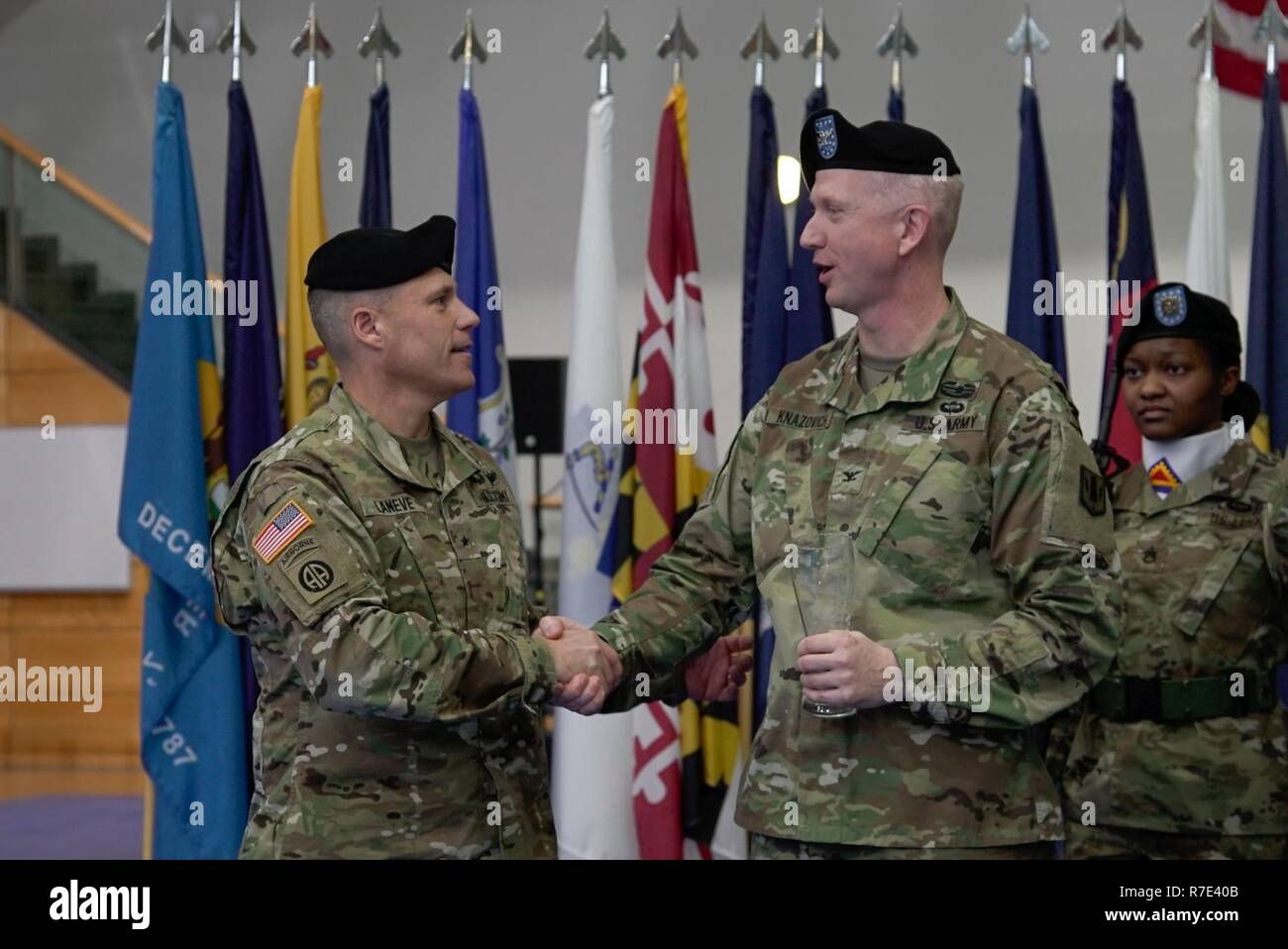 U.S. Army Brig. Gen. Christopher LaNeve, left, commanding general of ...