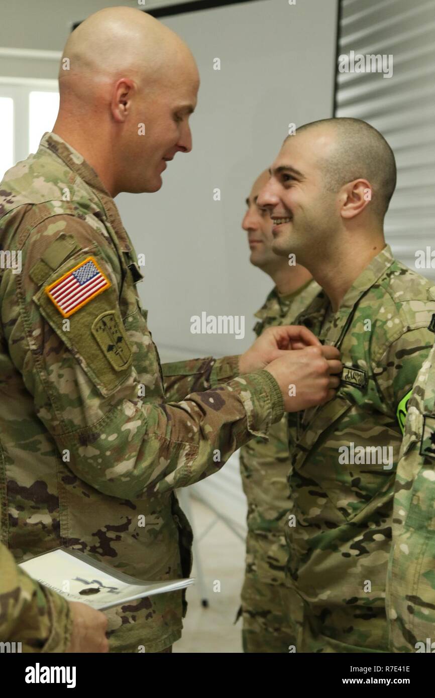U.S. Army Maj. David Farrar (left) the S3 operations officer for the ...