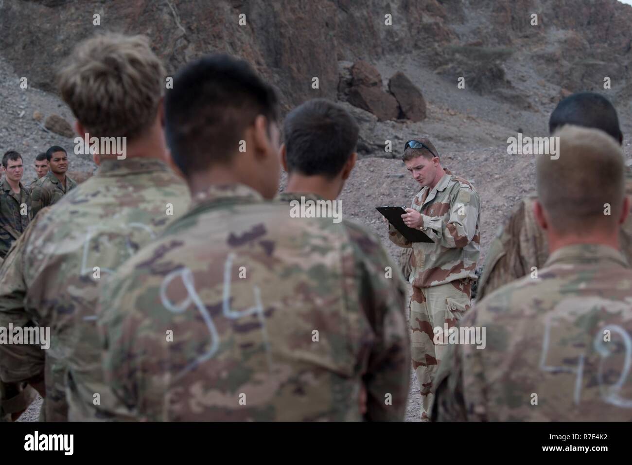 A French marine instructor calls out scores to U.S. service members and ...