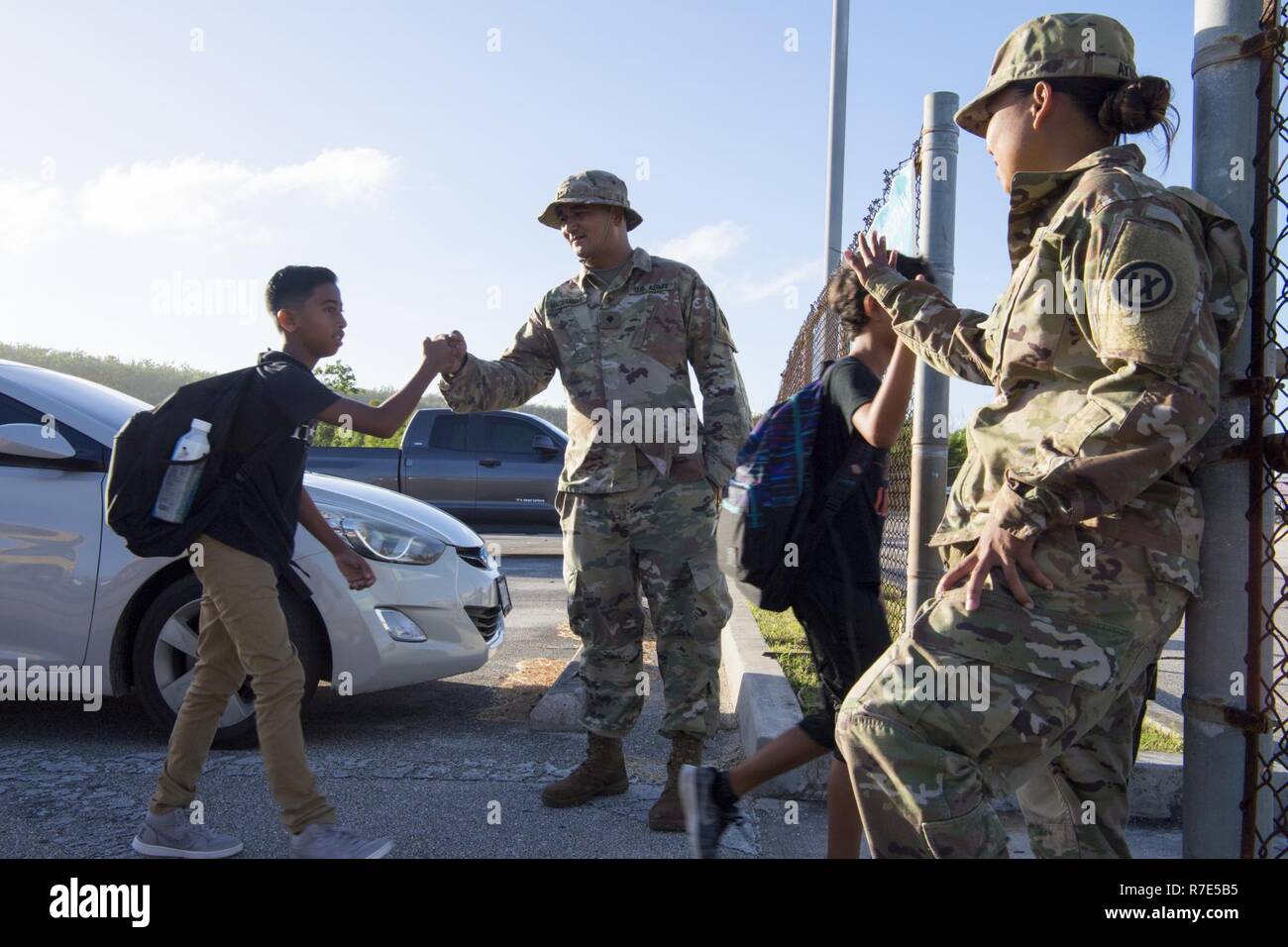 Students at Chacha Oceanview Middle School are greeted by Guam U.S ...