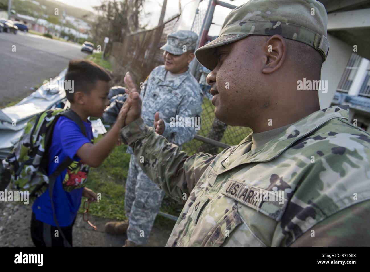 Guam Army National Guardsmen Pfc. Ryan Jimmy and Spc. Tristan Cruz ...