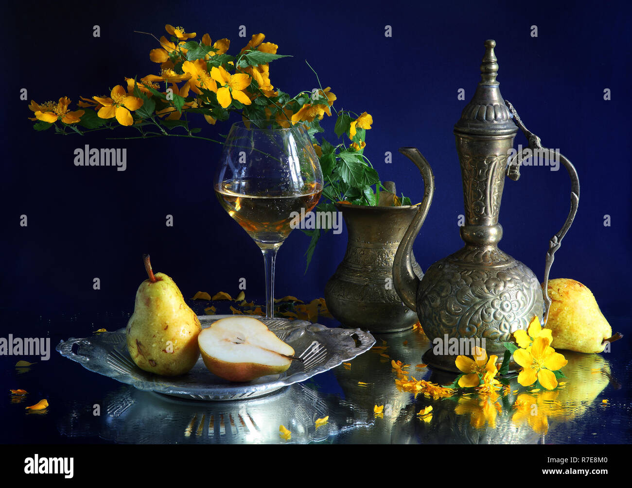 Still life with a copper jug and fruit Stock Photo - Alamy