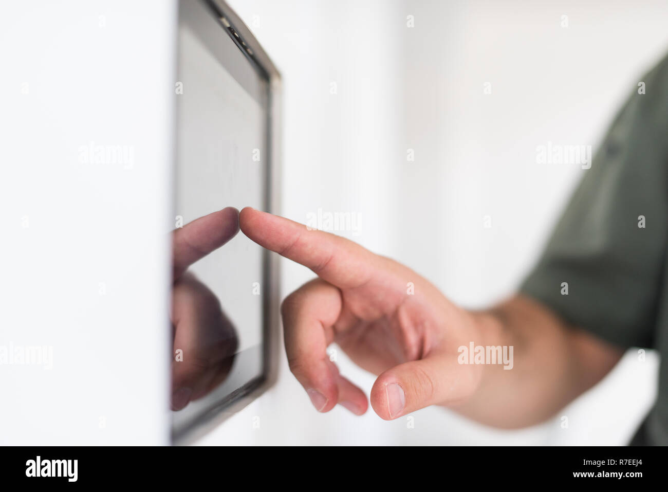 smart home and technology concept close up of male hands pointing ...