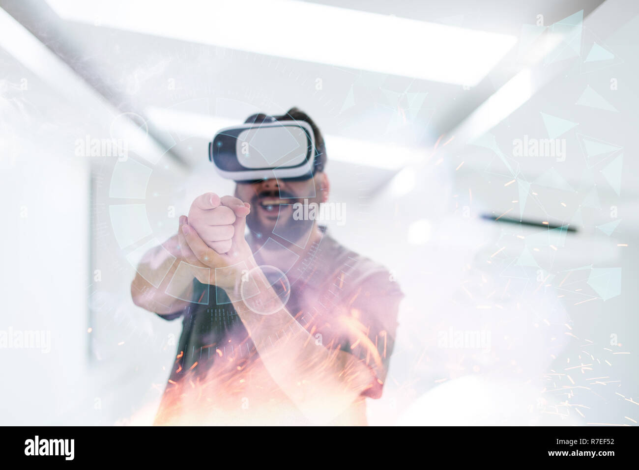 man trying virtual reality vr glasses at modern home with futuristic ...