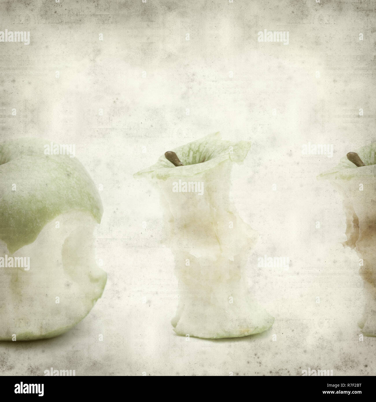 textured old paper background with green apple eating progression Stock ...