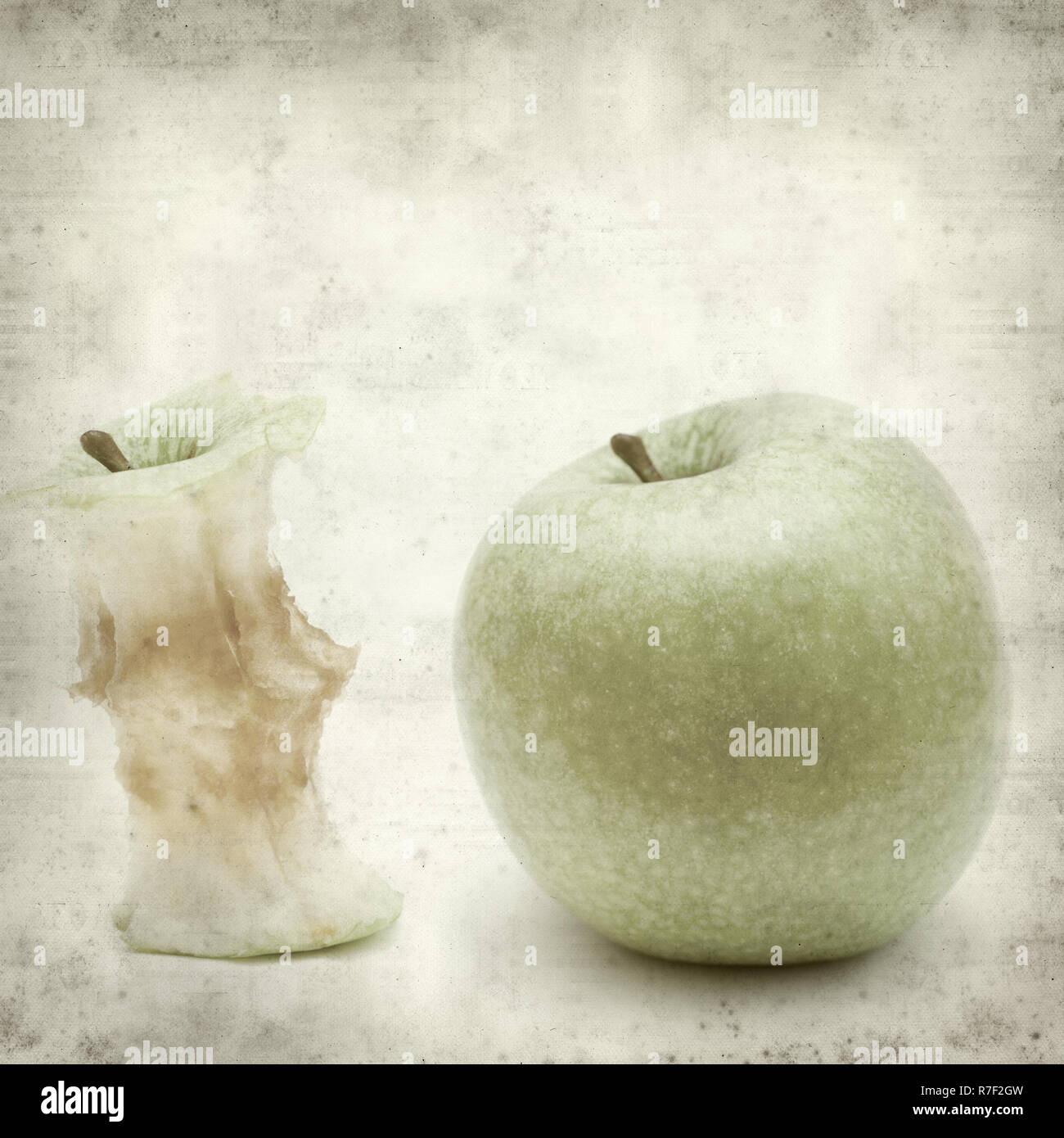textured old paper background with green apple eating progression Stock ...