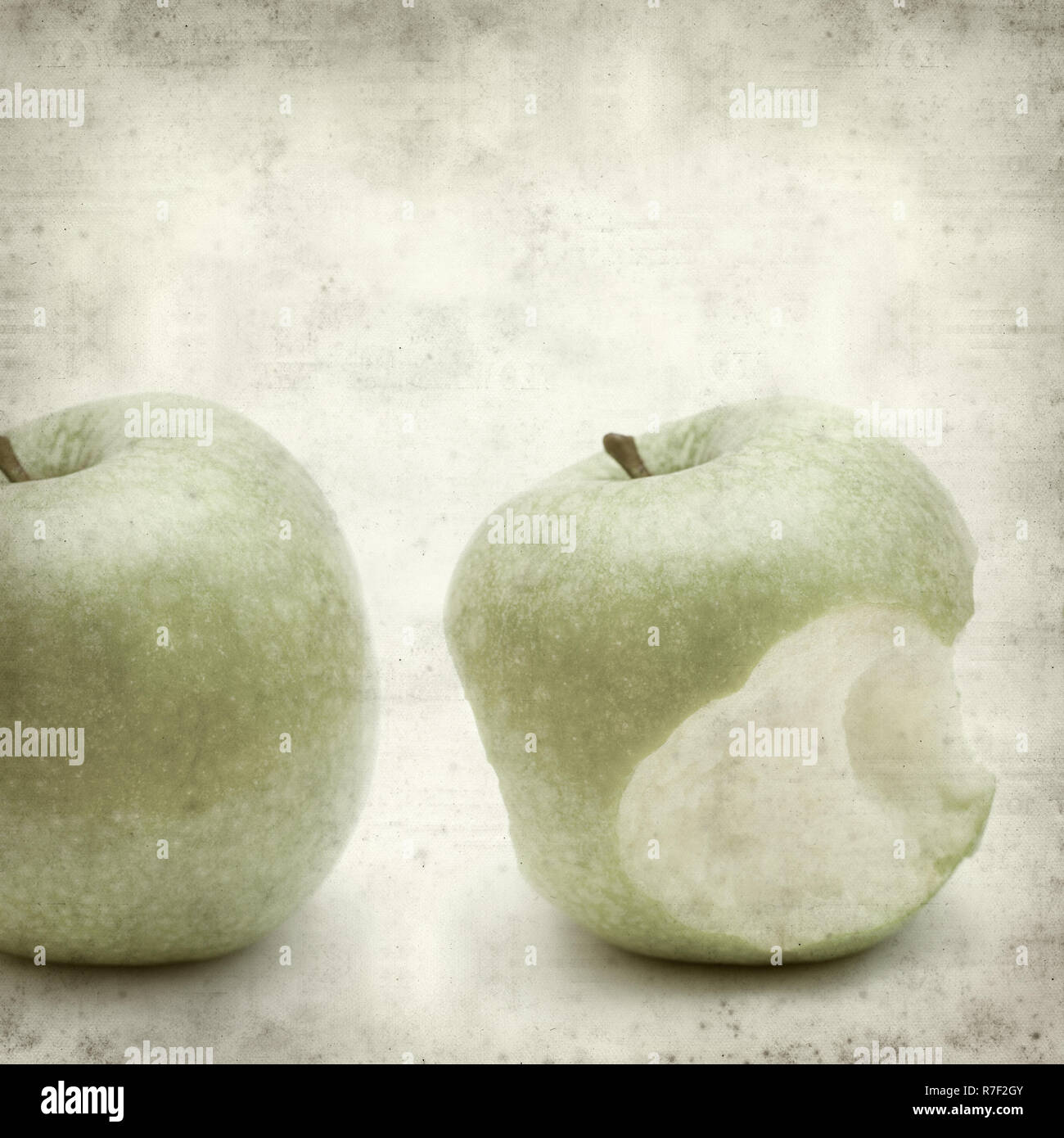 textured old paper background with green apple eating progression Stock ...