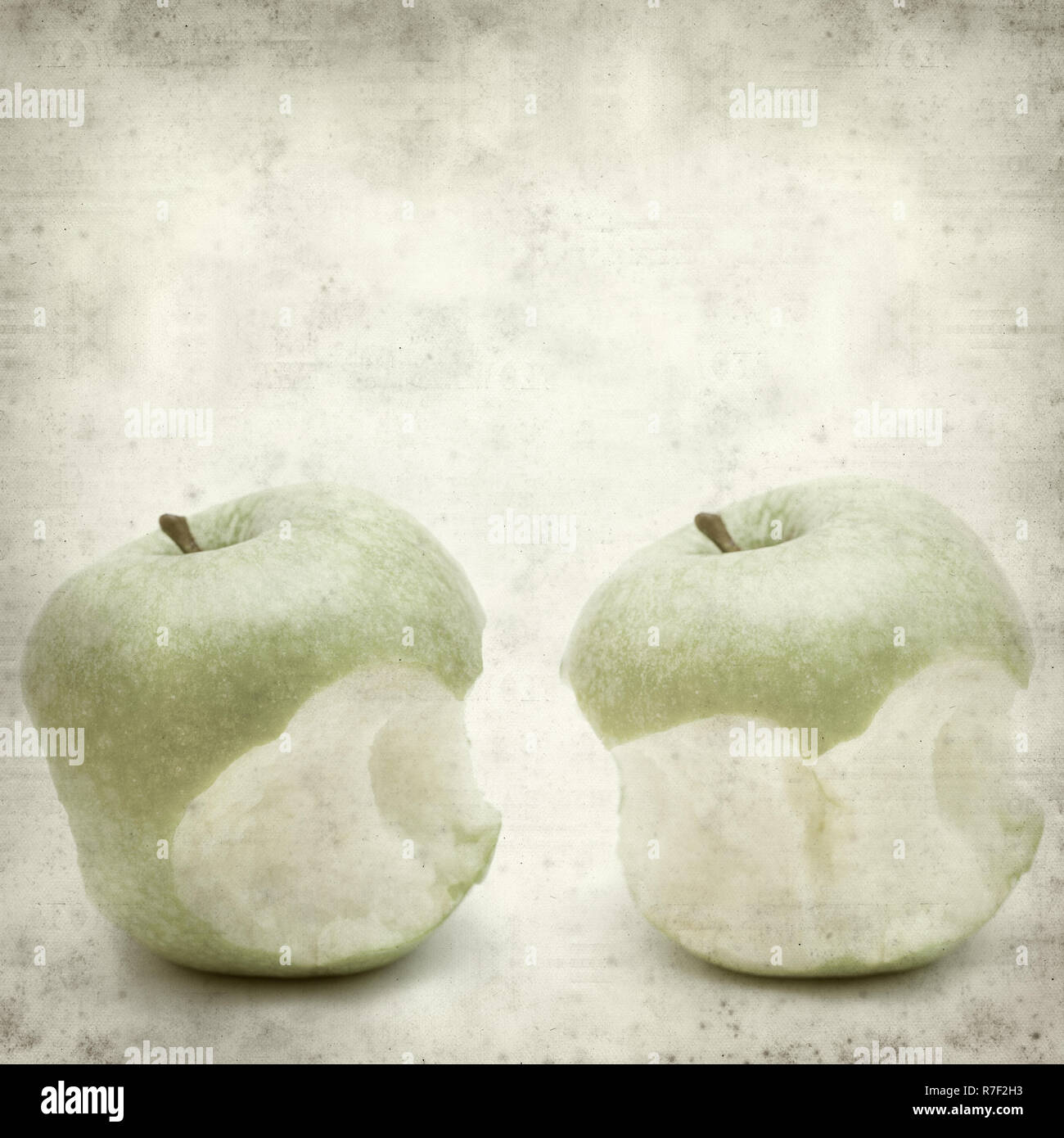 textured old paper background with green apple eating progression Stock ...