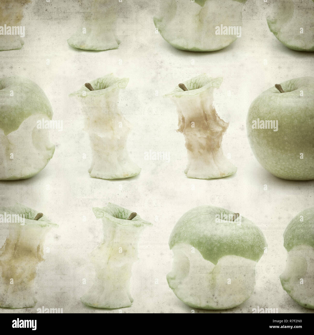 textured old paper background with green apple eating progression Stock ...