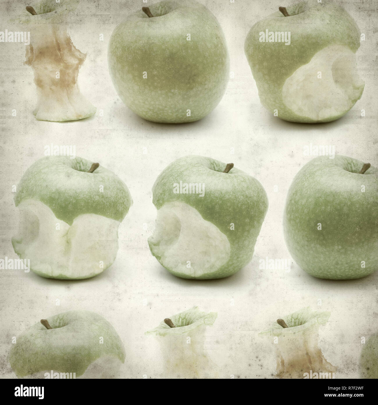 textured old paper background with green apple eating progression Stock ...