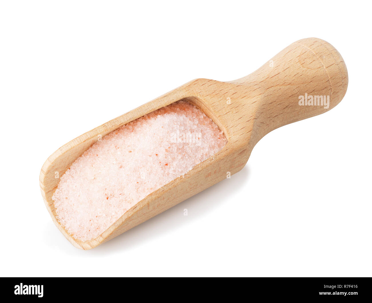 pink himalayan salt in wooden scoop isolated on white background Stock ...