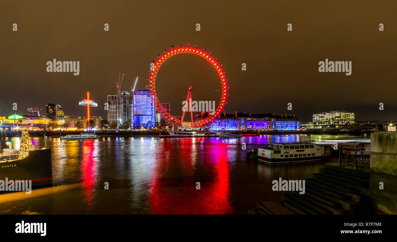 The London Eye from across the River Thames and Victoria Embankment ...