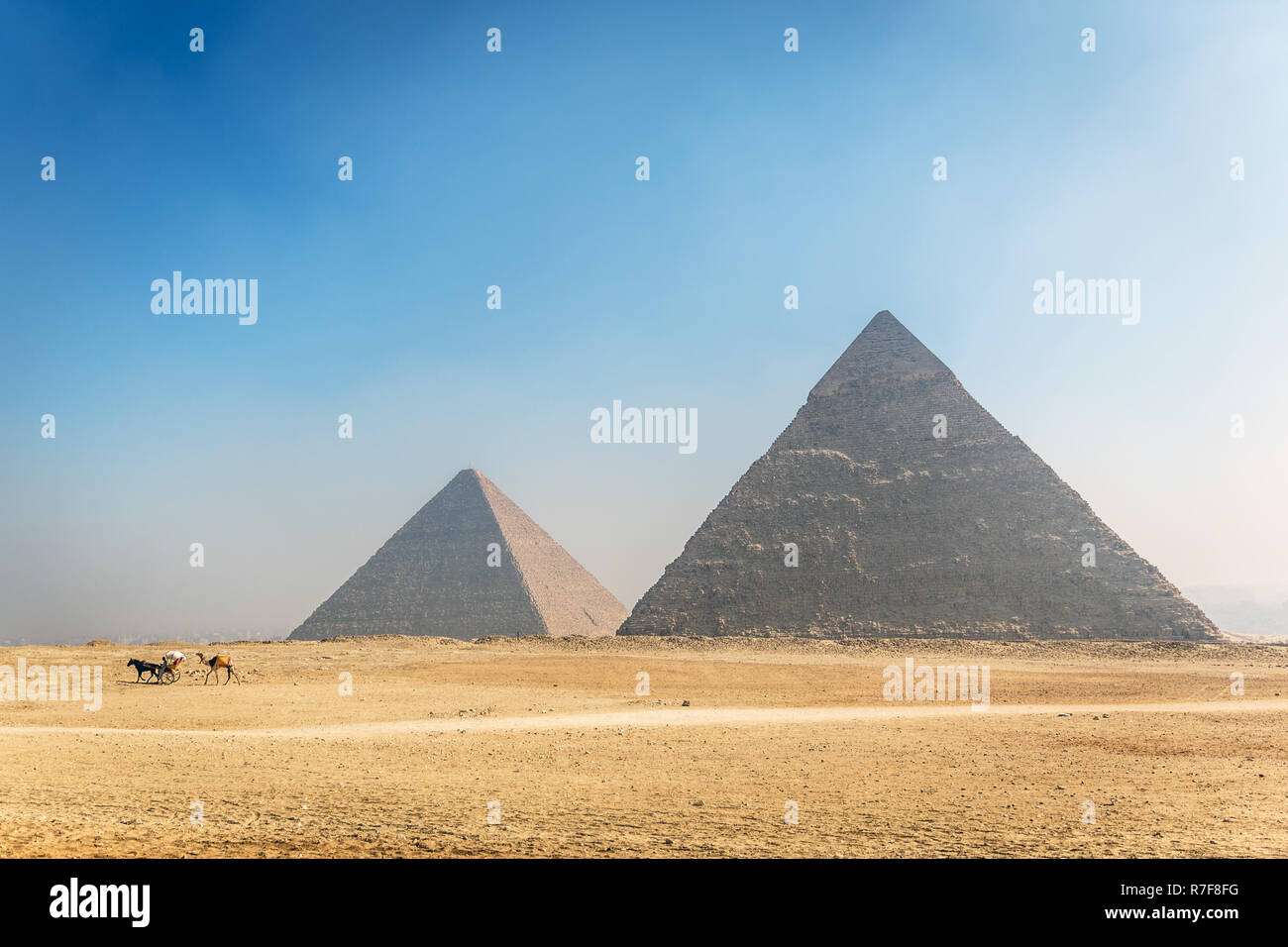 Amazing view of the pyramids of Giza in a blue sky day Stock Photo - Alamy