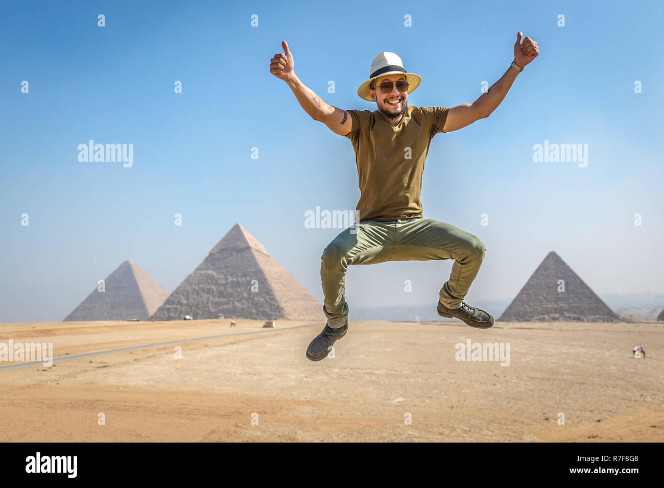 Cairo, Egypt - Nov 4th 2018 - A young man tourists having fun taking a ...