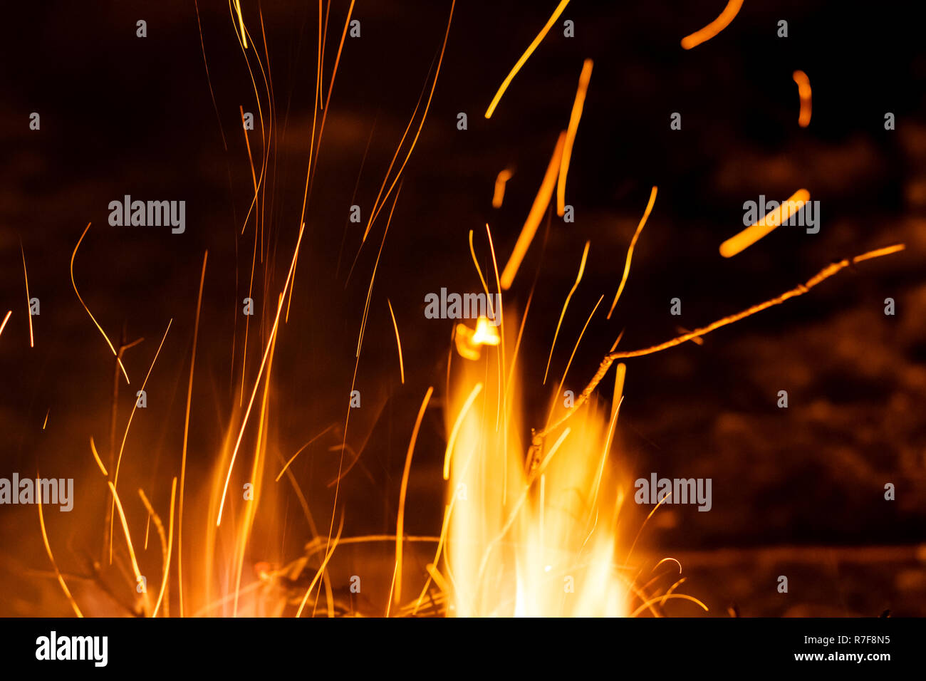Sparks from the fire Stock Photo - Alamy