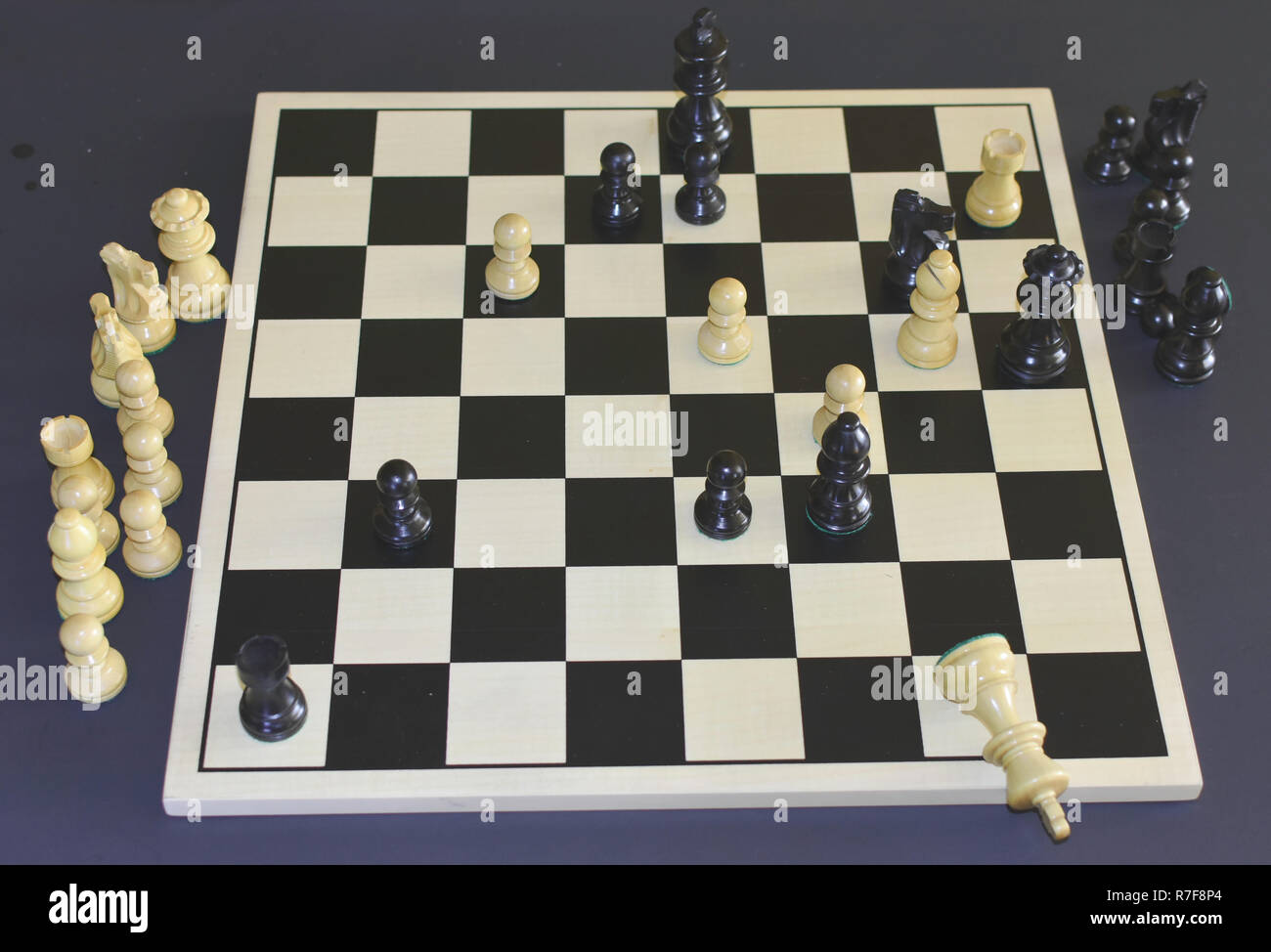 Chess pieces on board, checkmate Stock Photo - Alamy