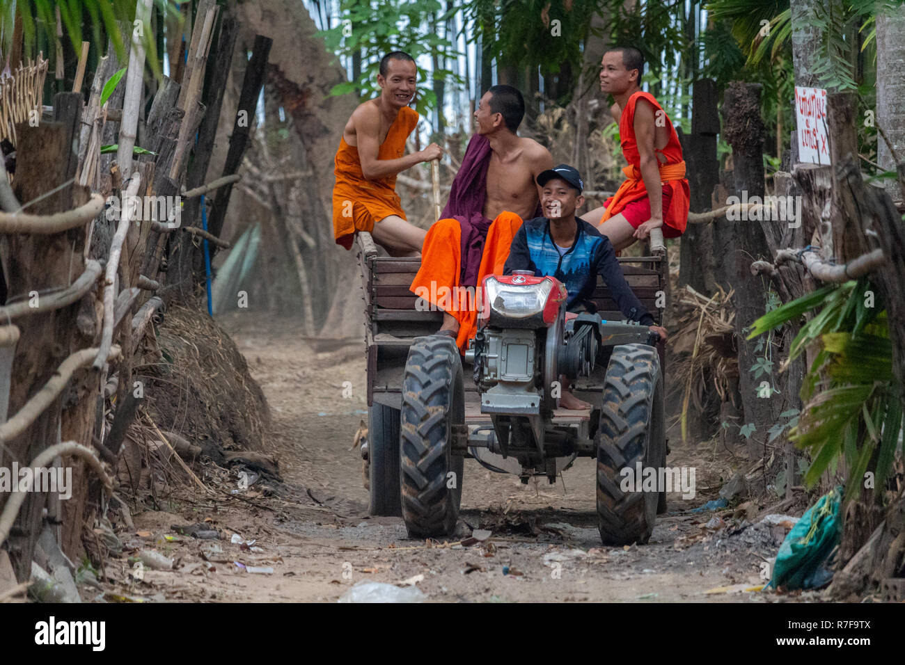 Don Daeng, Laos - April 27, 2018: Young buddhist monks sitting on a ...