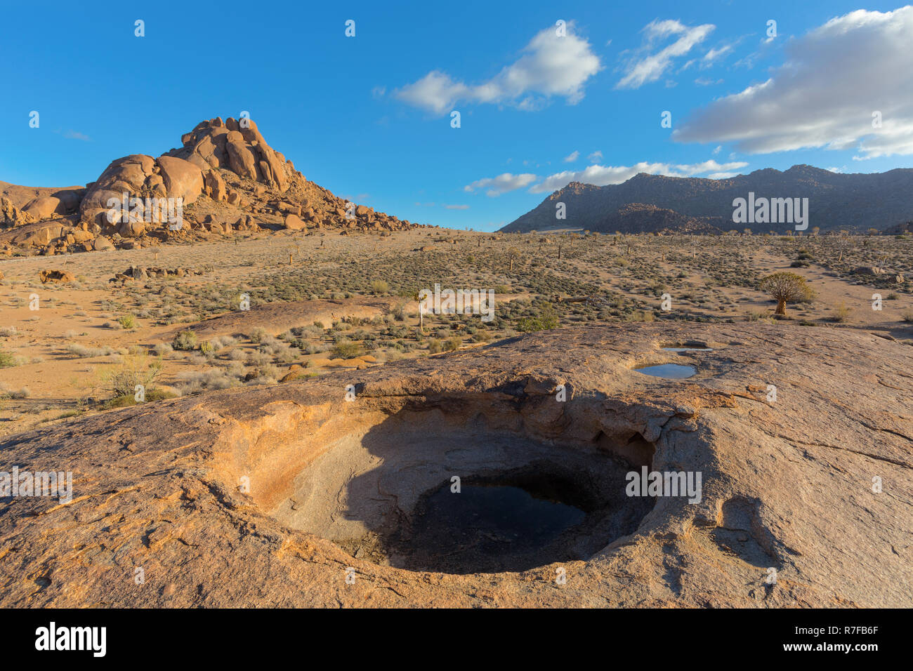 Big round hole in the rock Stock Photo - Alamy