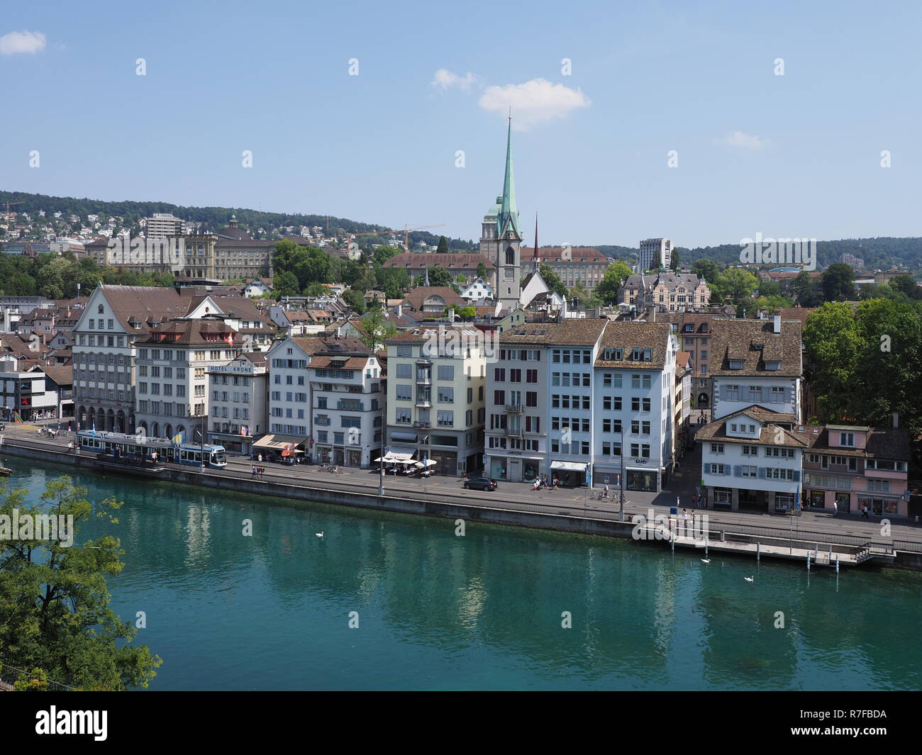 Scenic houses on bank of Limmat river and european cityscape landscape ...