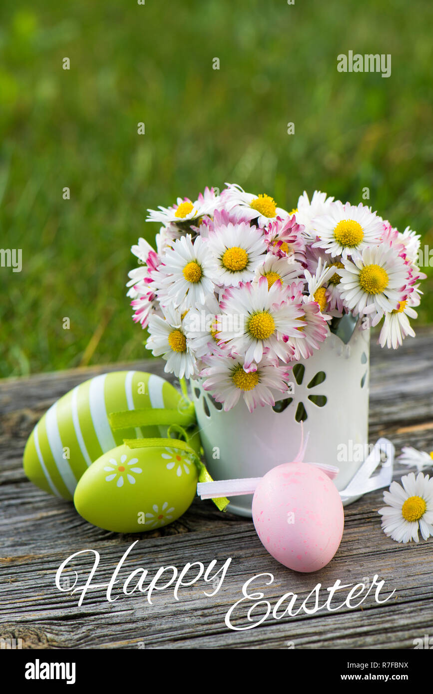 Daisy flowers with easter eggs Stock Photo - Alamy
