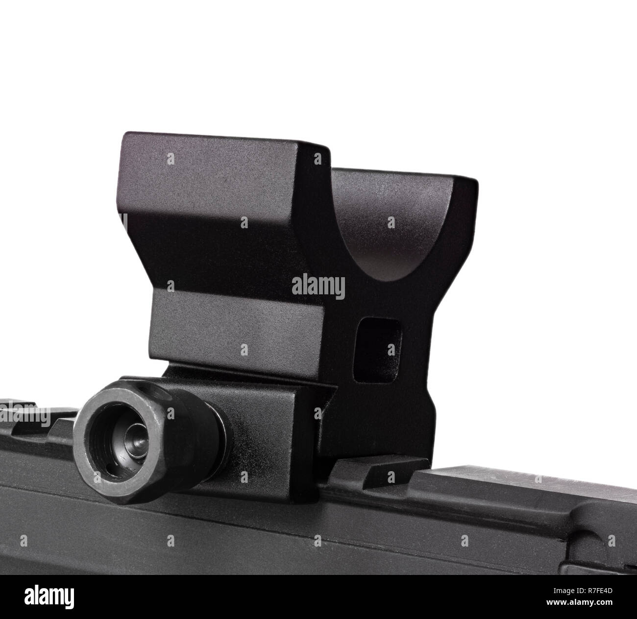 Rifle sight base installed on an AR-15 rail with white behind Stock ...