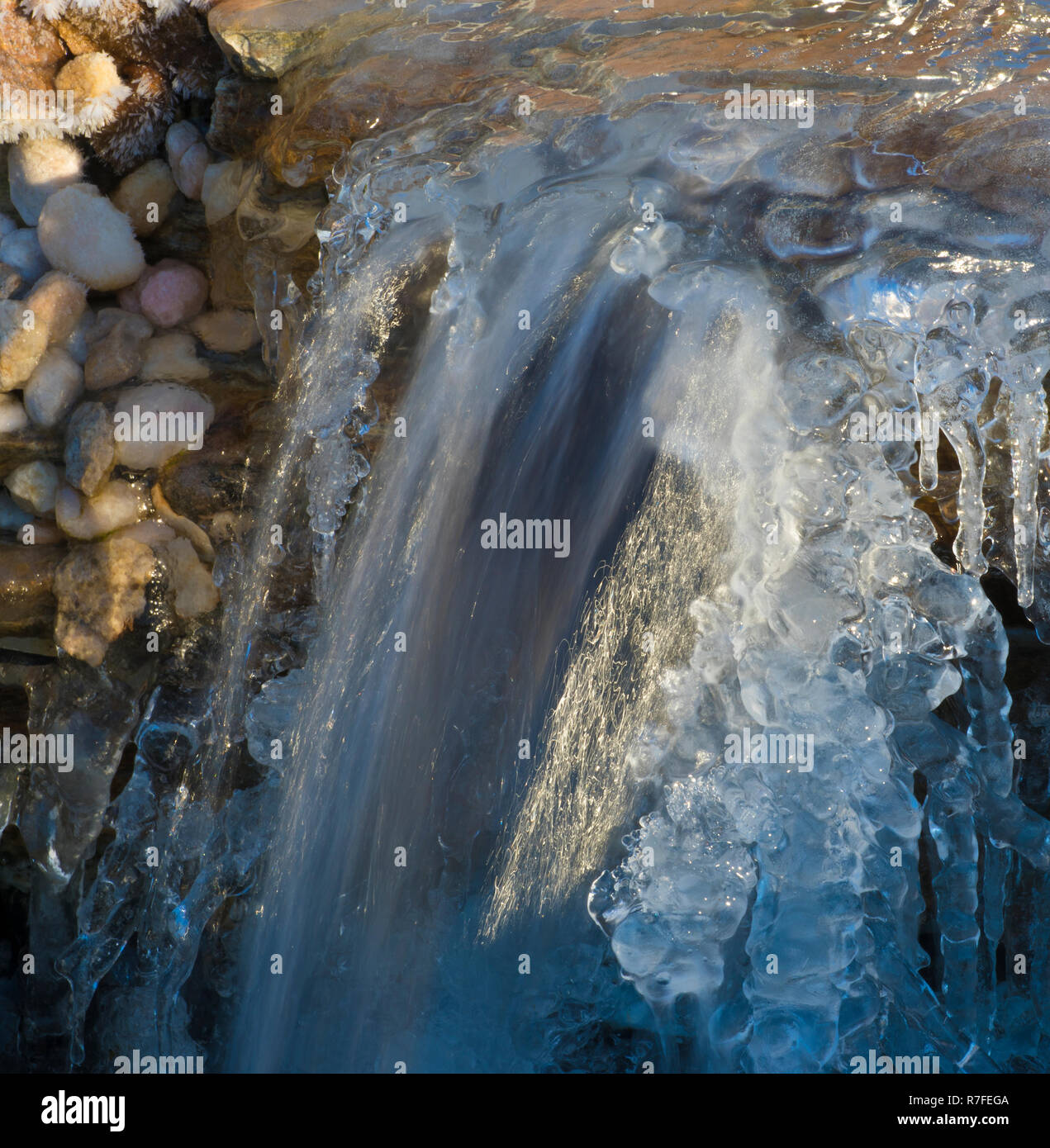Snow bomb cyclone in North Carolina freezing over a pond waterfall ...