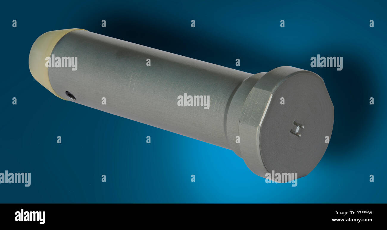 Heavy version of a buffer weight used in an AR-15 on blue Stock Photo ...